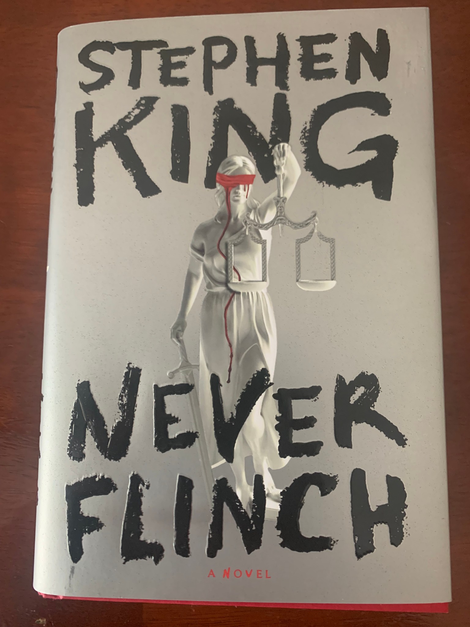 Book Review: Never Flinch – Milam's Musings